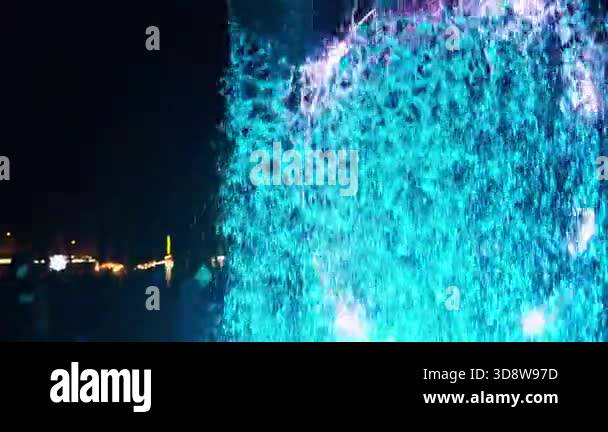 Night fountain cascade in Riga, Latvia shows fast falling water and ...