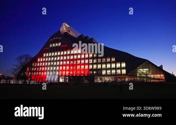 The National Library of Latvia in Riga is lit in red and white for ...