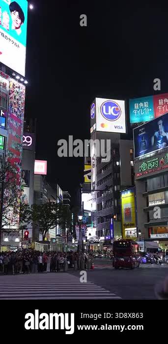 Night street level view of Shibuya scramble crossing in Tokyo. Shibuya ...