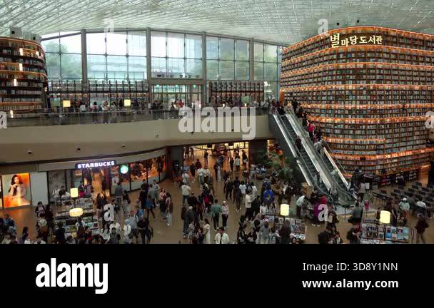 SEOUL, SOUTH KOREA - OCTOBER 11, 2025 - People enjoying reading and ...