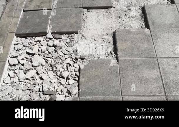 Hazards from uneven pavement and crumbling brick structures Stock Video ...