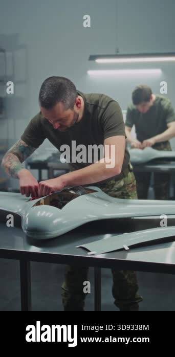 Synchronized Drone Production Team Simultaneously Assembling Large UAV ...