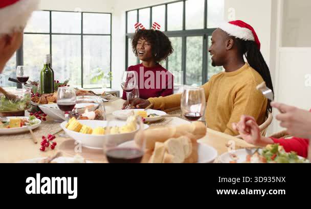African American woman in red sweater receiving hand clap and giving ...