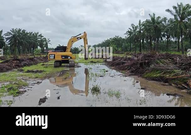 Perak, Malaysia. November 25,2025: Caterpillar Excavator with Hammer ...