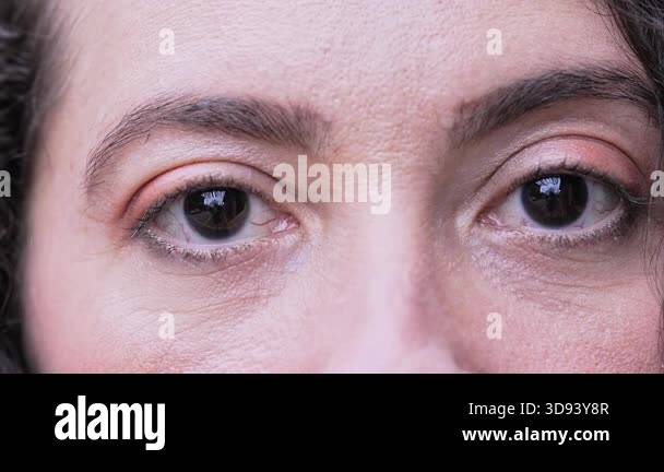 Soft Close-Up Of Womans Dark Eyes Lightly Lined With Makeup Showing ...