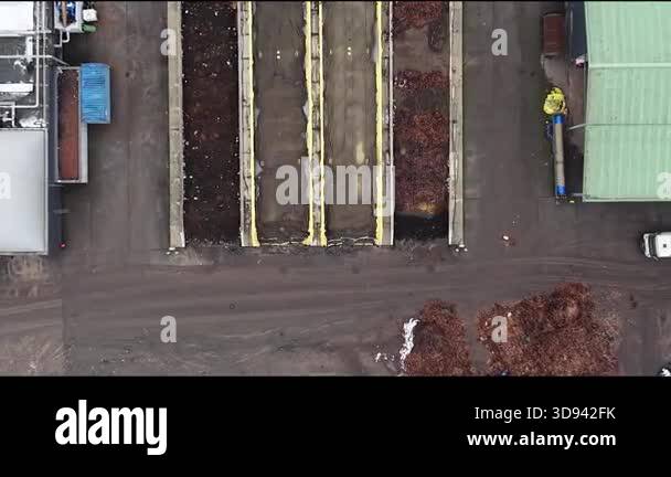 Cesis, Latvia - November 21, 2025: Aerial footage captures industrial ...
