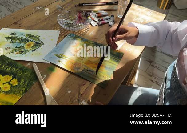 A talented and skilled artist proudly showcases her vibrant array of ...