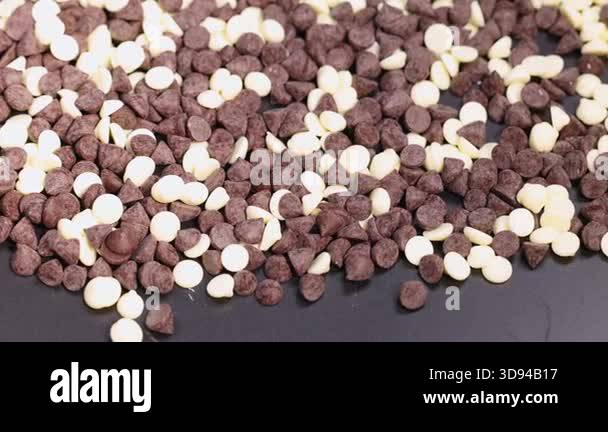 Dark and white chocolate pieces on display Stock Video Footage - Alamy