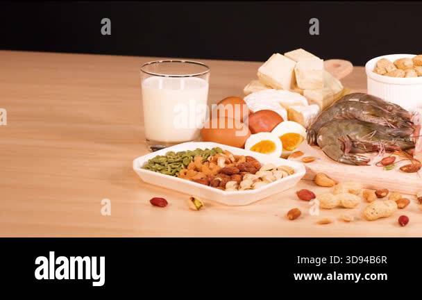Variety of protein sources arranged on a table Stock Video Footage - Alamy