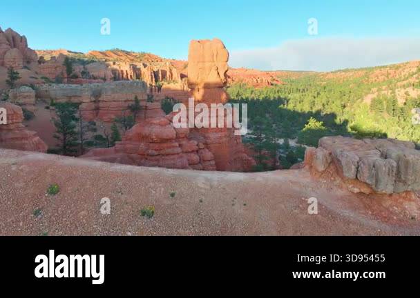 Stunning aerial tracking shot glides over iconic hoodoo rock spires in ...