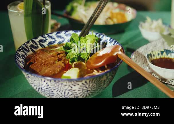 Close up shot of traditional Vietnamese Pho Bo soup served in a ...