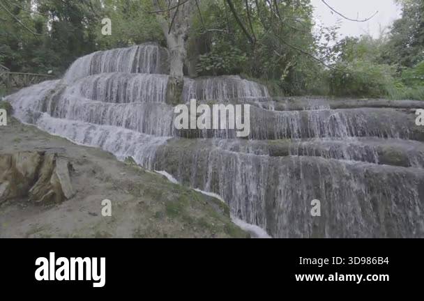Scenic tiered waterfall flowing in forest stream Stock Video Footage ...