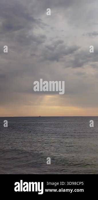 Rain in sea. Rain falling in sea. Cloudy, rainy, stormy weather at sea ...
