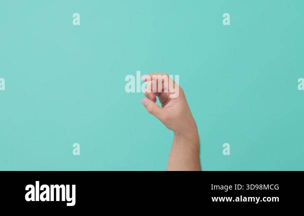 Close up shot of human hand raising stretch out hand flicking off ...