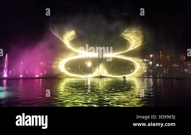 Stunning water show footage featuring synchronized fountains, lights ...