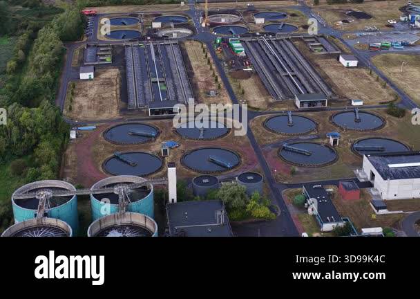 Aerial drone footage of a modern wastewater and sewage treatment plant ...