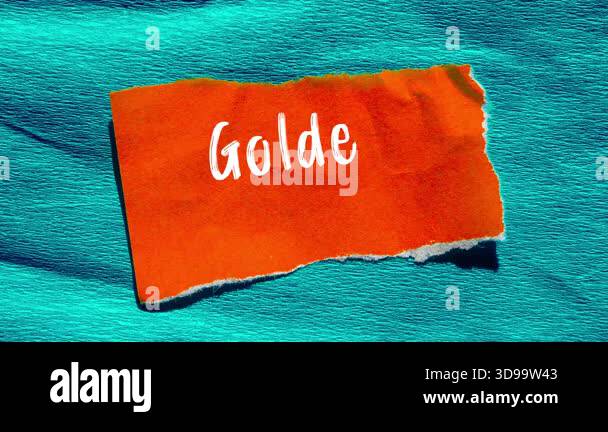 Golden rule message writing on ripped torn paper background Stock Video Footage - Alamy