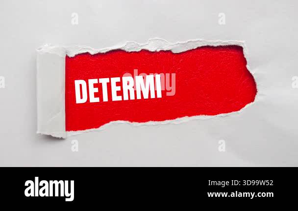 Determination message written on ripped torn paper background Stock ...