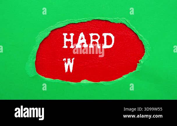 Hard Work message written on ripped torn paper background. Conceptual ...
