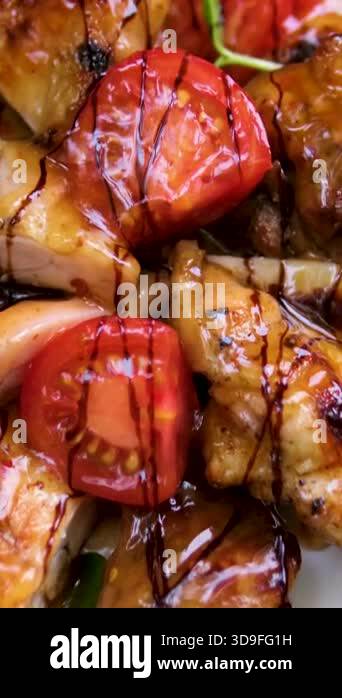 A bowl of chicken popcorn rice with sweet and sour sauce, sprinkled ...