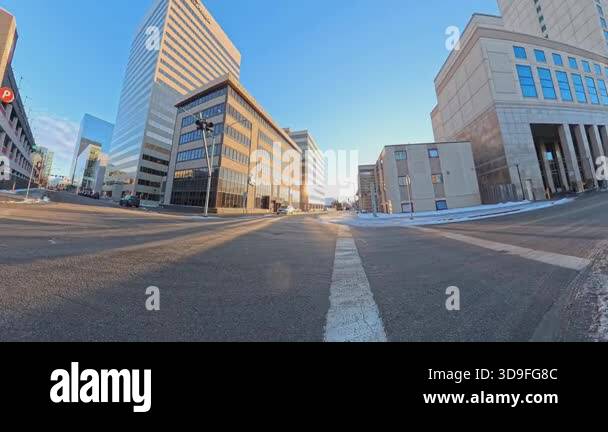 A sunny winter afternoon in downtown Anchorage, Alaska, featuring a ...