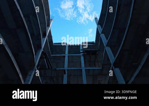 Rising in the open space inside the multi-storied building. Going up to ...