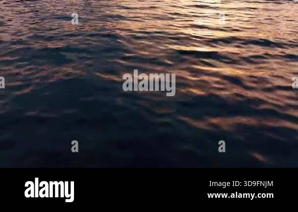 Deep blue waterscape colored with setting sun. Seascape background from ...