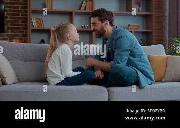 Happy Caucasian family daddy and daughter talking playing laughing ...