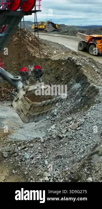 shovel loading cycle with trucks moving along haul road, synchronized ...