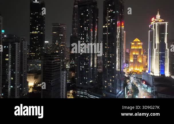 time lapse shot of a large, dense metropolitan city dominated by a mix ...