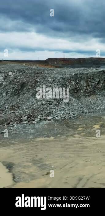 wide view stripped plateau layered rock faces and muddy floor, distant ...