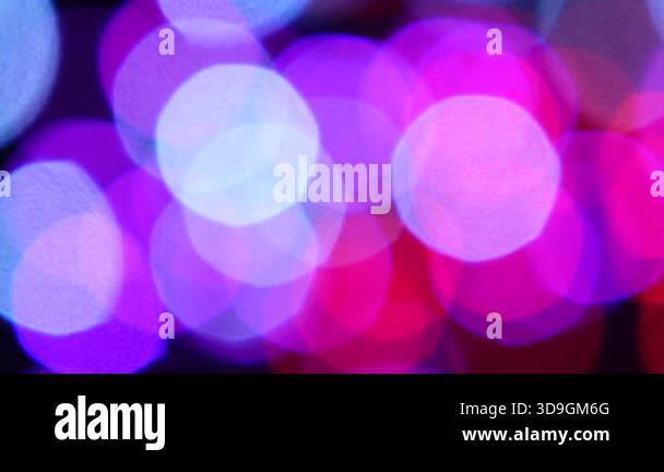 Purple and red bokeh string lights, ideal for creating a festive ...