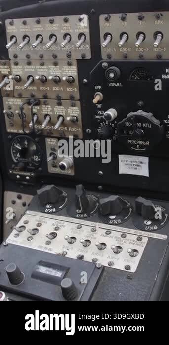 Vertical video. Close-up of cockpit with instruments and panels and ...