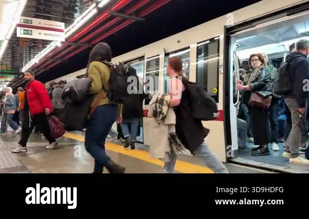 People in Rome metro captured train walk across platform pass through ...