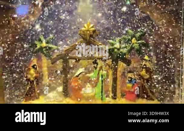 4k footage christmas sparkling snow ball, depicting Jesus was born on a ...