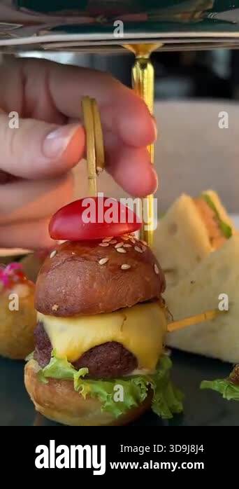 Mini burgers platter of Small Gourmet Burgers Close-Up of Mini Sliders ...