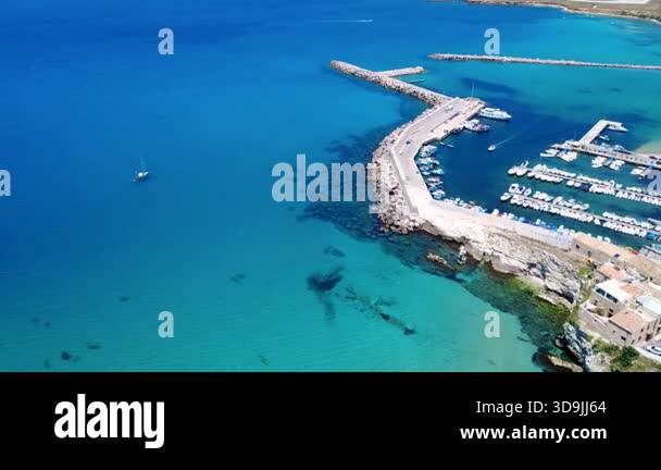 Boats Docked in a Beautiful Harbor Near a Sandy Beach on a Sunny Day in ...