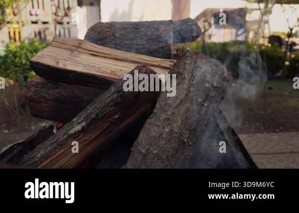 Burning Oak Wood in a Farmhouse Garden Stock Video Footage - Alamy