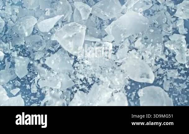 Super Slow Motion Shot of Real Ice Cuts Exploding Towards Camera on ...