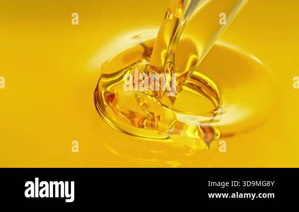 Super Slow Motion Shot of Pouring and Splashing Golden Oil Liquid at ...