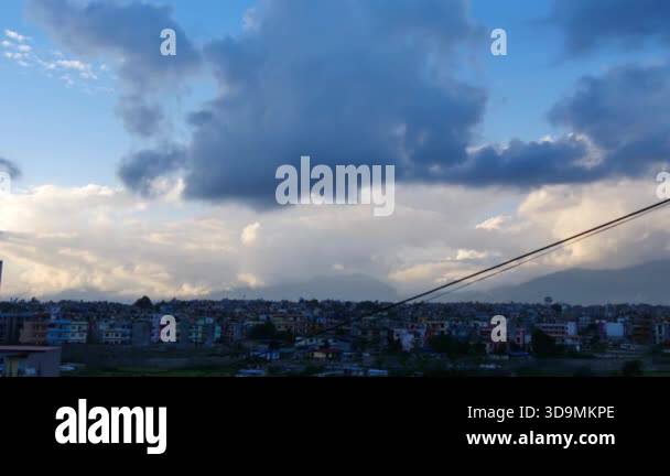 Composition of city buildings and evening sky with light and dark ...
