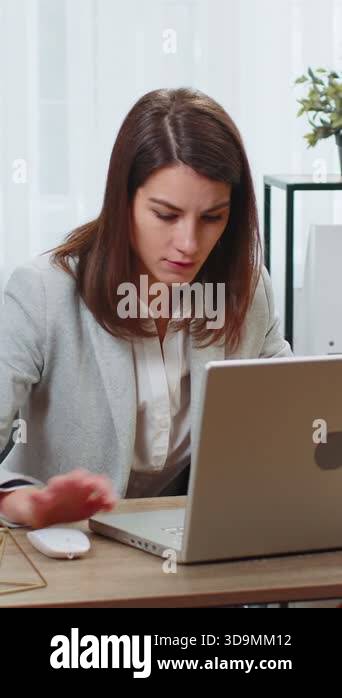 Upset Caucasian business woman programmer software developer in formal ...