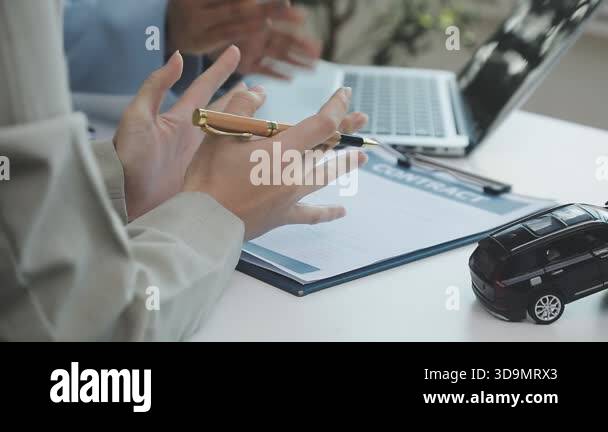 Man signing car insurance document or lease paper. Writing signature on ...