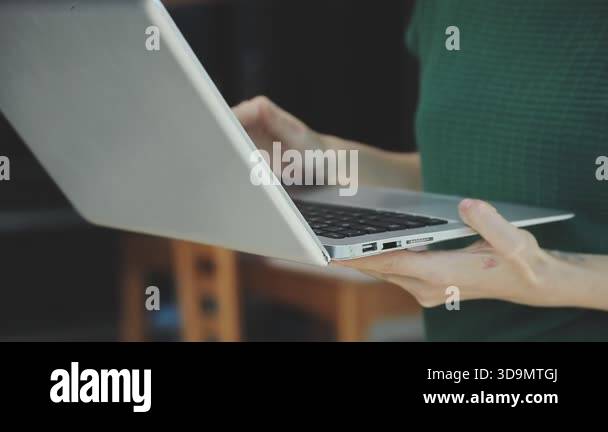 Two financial accountants analysing business spreadsheets on laptop ...