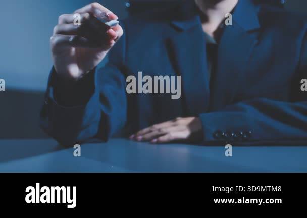 Two financial accountants analysing business spreadsheets on laptop ...