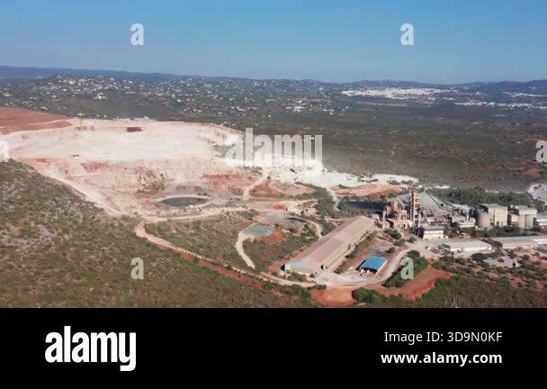 Drone captures quarry with water reservoir and machinery, Unmanned ...