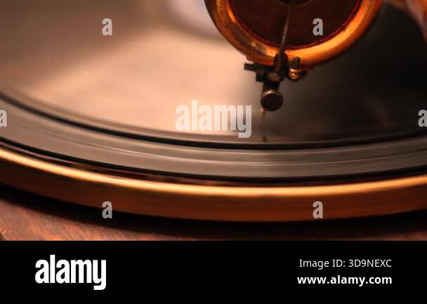 Retro vinyl gramophone from 1920s with brass horn and manual spring ...