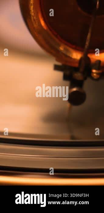 Retro vinyl gramophone from the 1920s with a brass horn and manual ...
