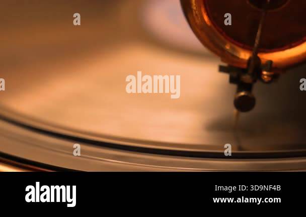 Retro vinyl gramophone from the 1920s with a brass horn and manual ...