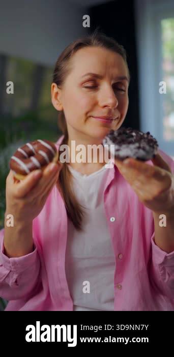 Binge eating concept. Attractive Caucasian woman with eating disorder ...